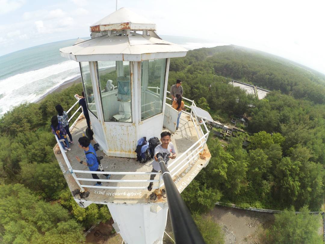 Goa Cemara Beach and its Magnificent Lighthouse